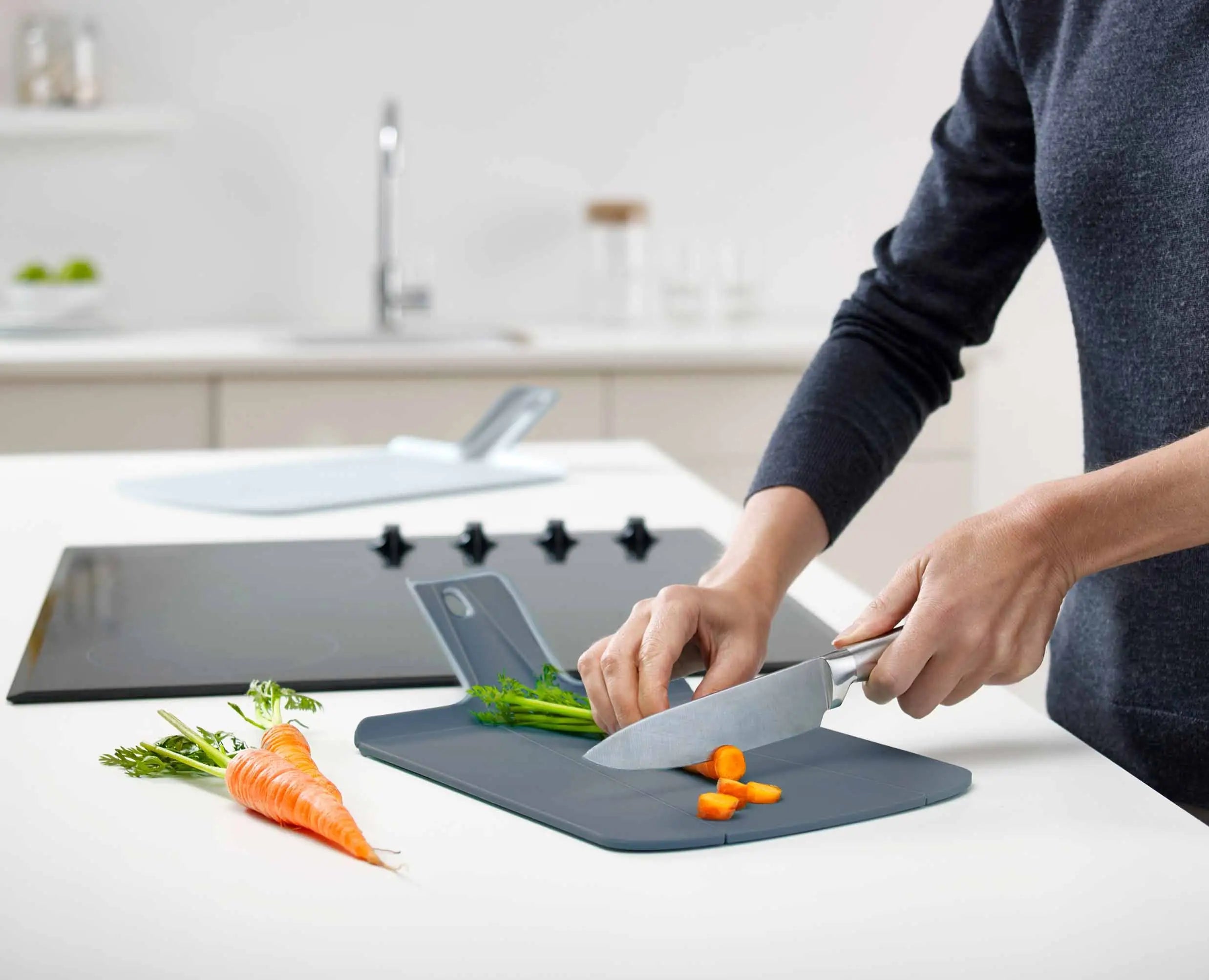 Chop2Pot™ Plus 2-piece Chopping Board Set | Joseph Joseph UK